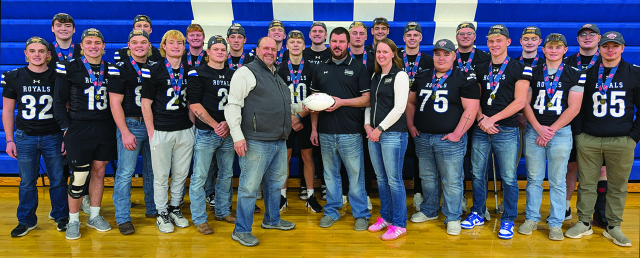Cherokee/Plymouth County Farm Bureau Presents MMCRU Footballs to Team